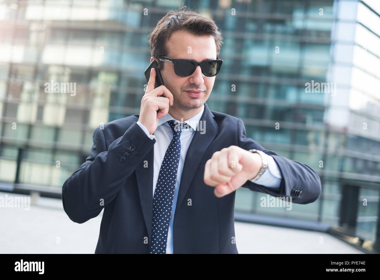 Guard checking the time hi-res stock photography and images - Alamy