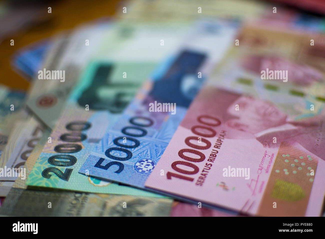 colorful Indonesia banknotes stacked Stock Photo - Alamy