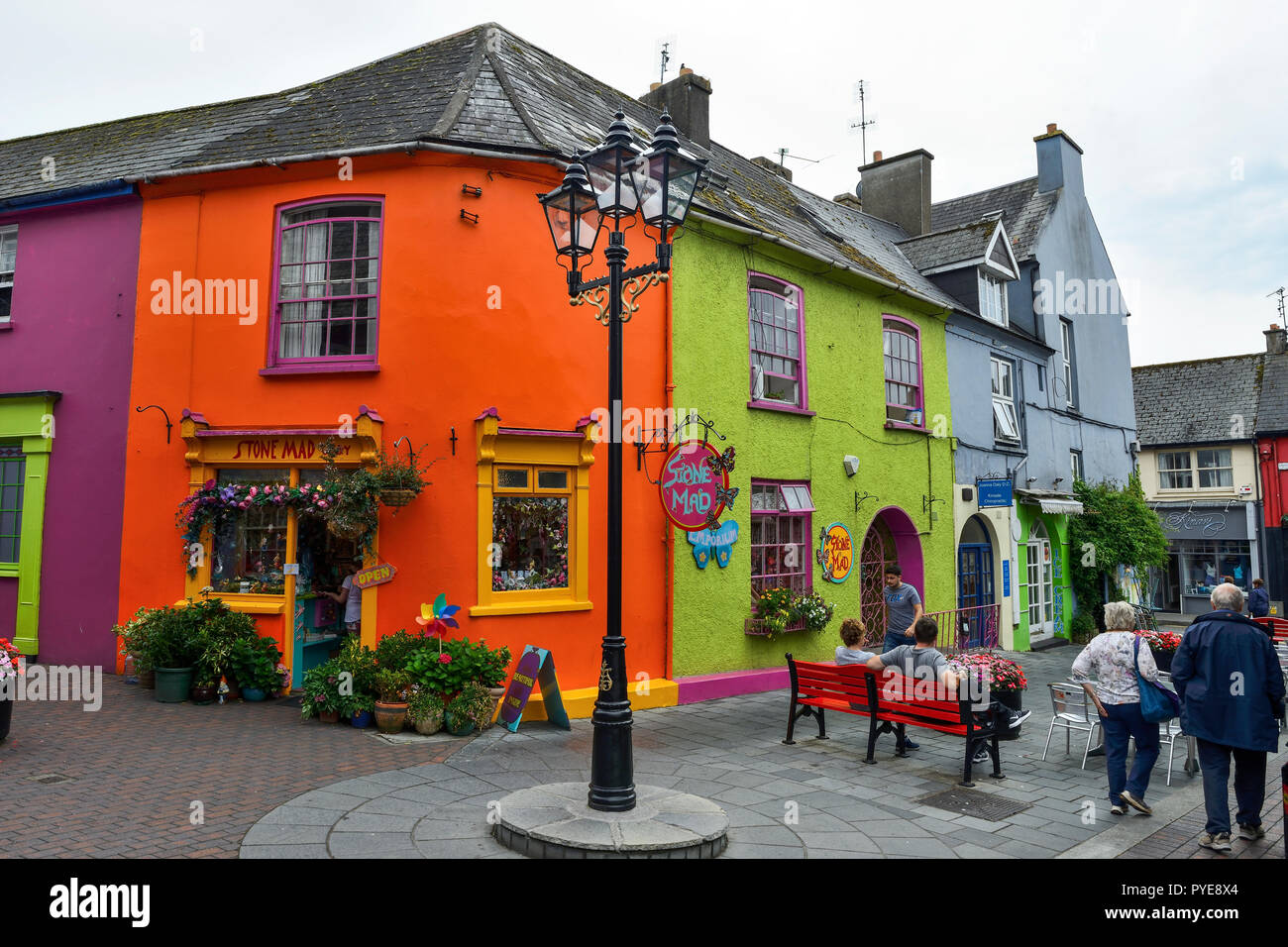 Colourful facades of shops and galleries in Newman's Mall in town ...