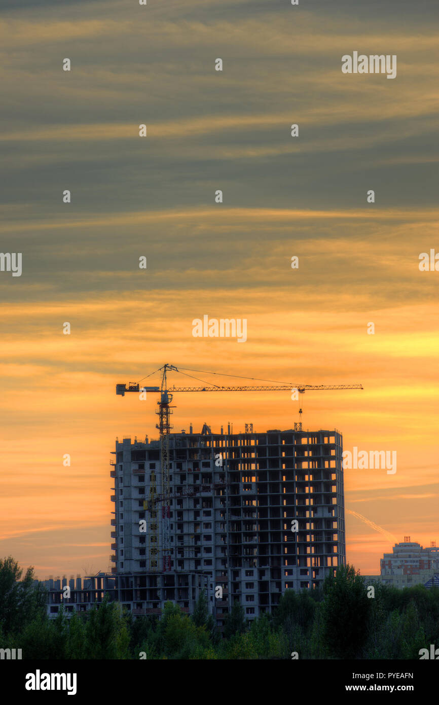 Construction silhouette on sunset background hi-res stock photography ...
