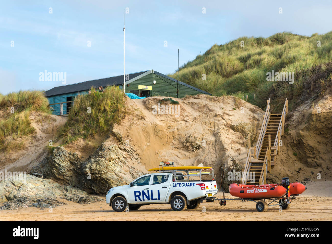 A RNLI Lifeguard emergency response vehicle with trailer parked on the ...