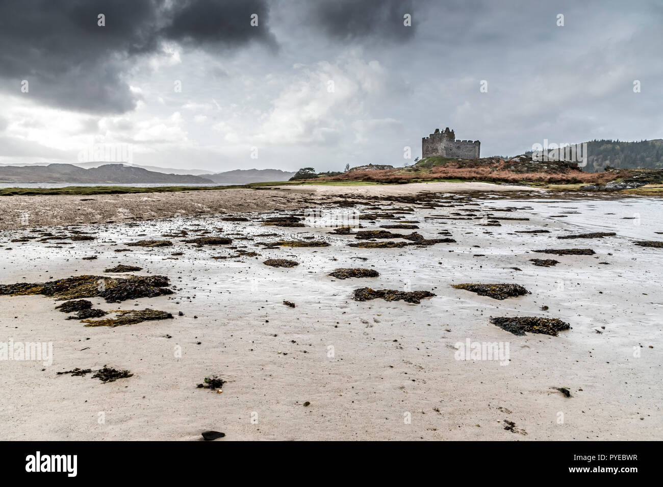 The ruins of Clan MacDonalds 13th century Castle Tioram on the shores ...