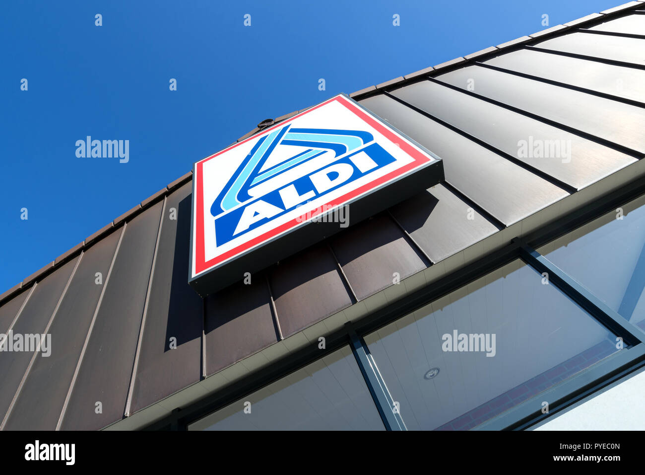 Aldi sign (north division) at branch. Aldi is a leading global discount ...