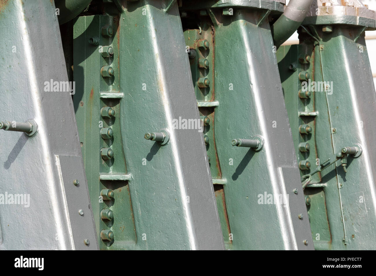 Large boat engine. Industrial texture Dominant colors in green and ...