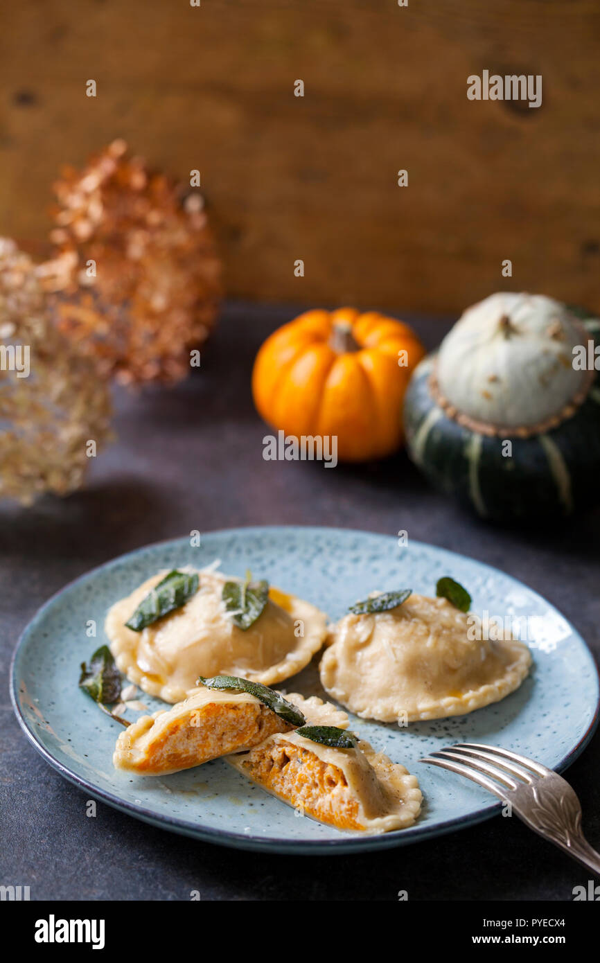Pumpkin and ricotta ravioli with crispy sage, burnt butter sauce and ...