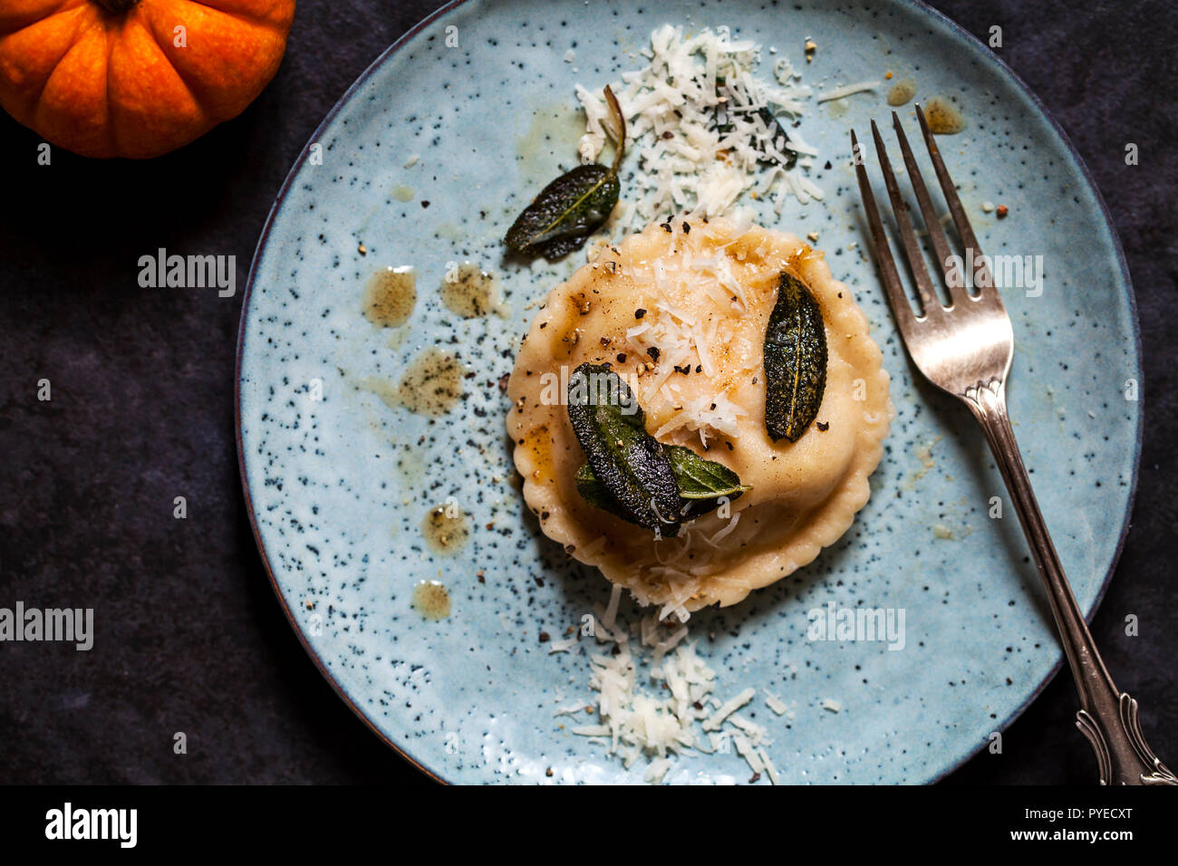 Pumpkin and ricotta ravioli with crispy sage, burnt butter sauce and ...