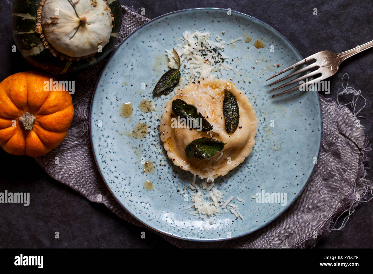 Pumpkin and ricotta ravioli with crispy sage, burnt butter sauce and ...