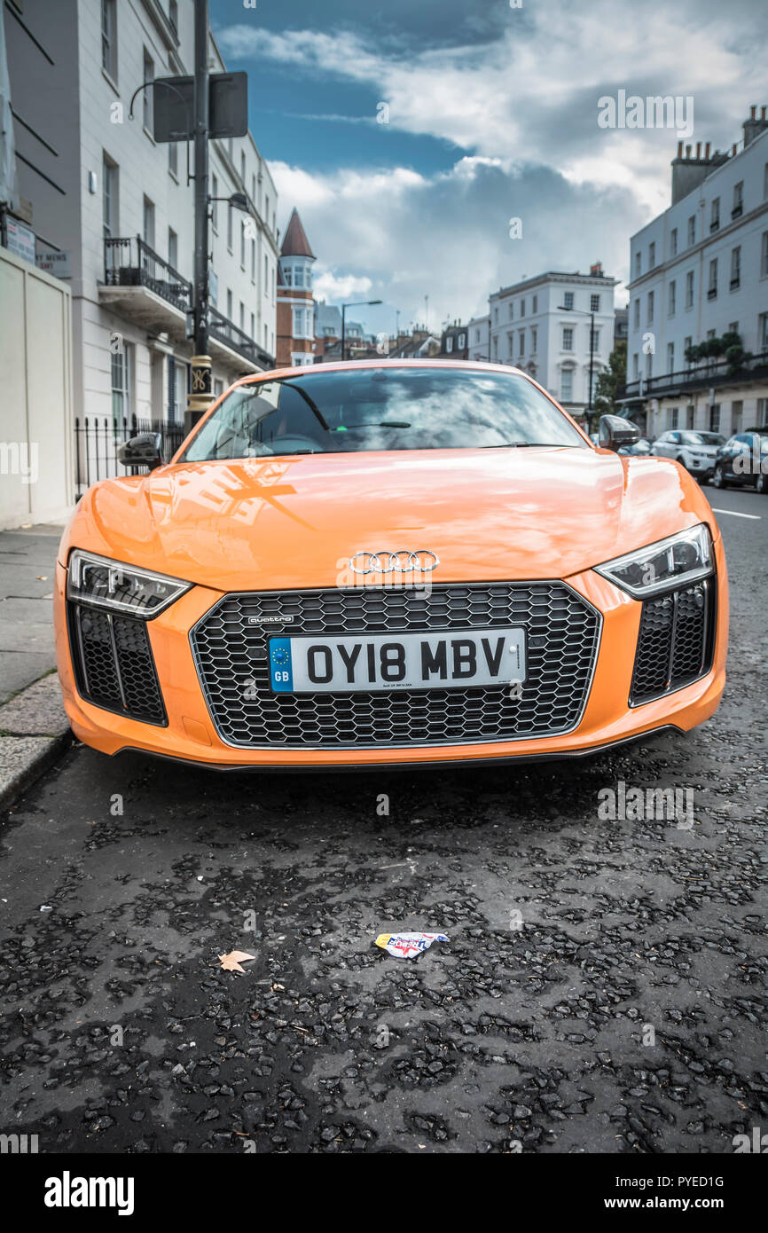 An orange Audi R8 high performance supercar in Westminster, London, UK ...