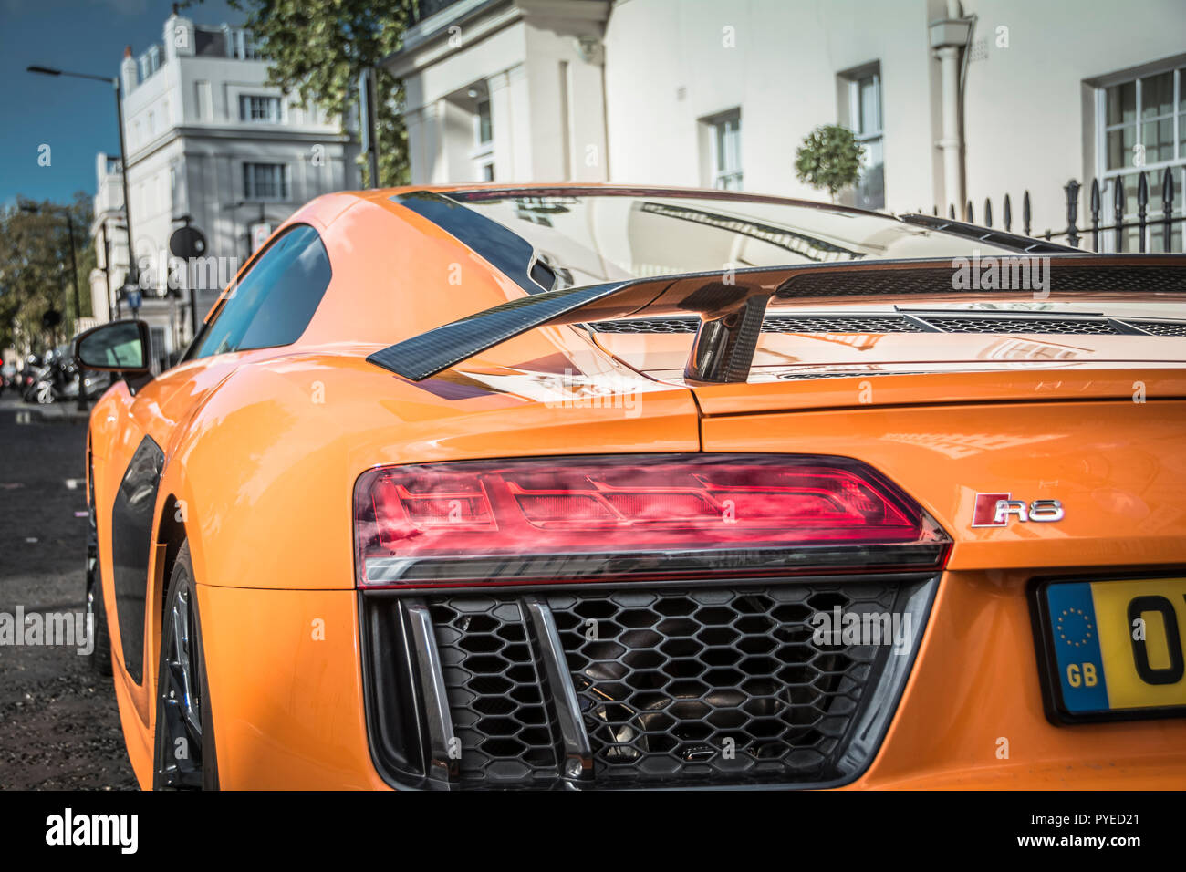 An orange Audi R8 high performance supercar in Westminster, London, UK ...