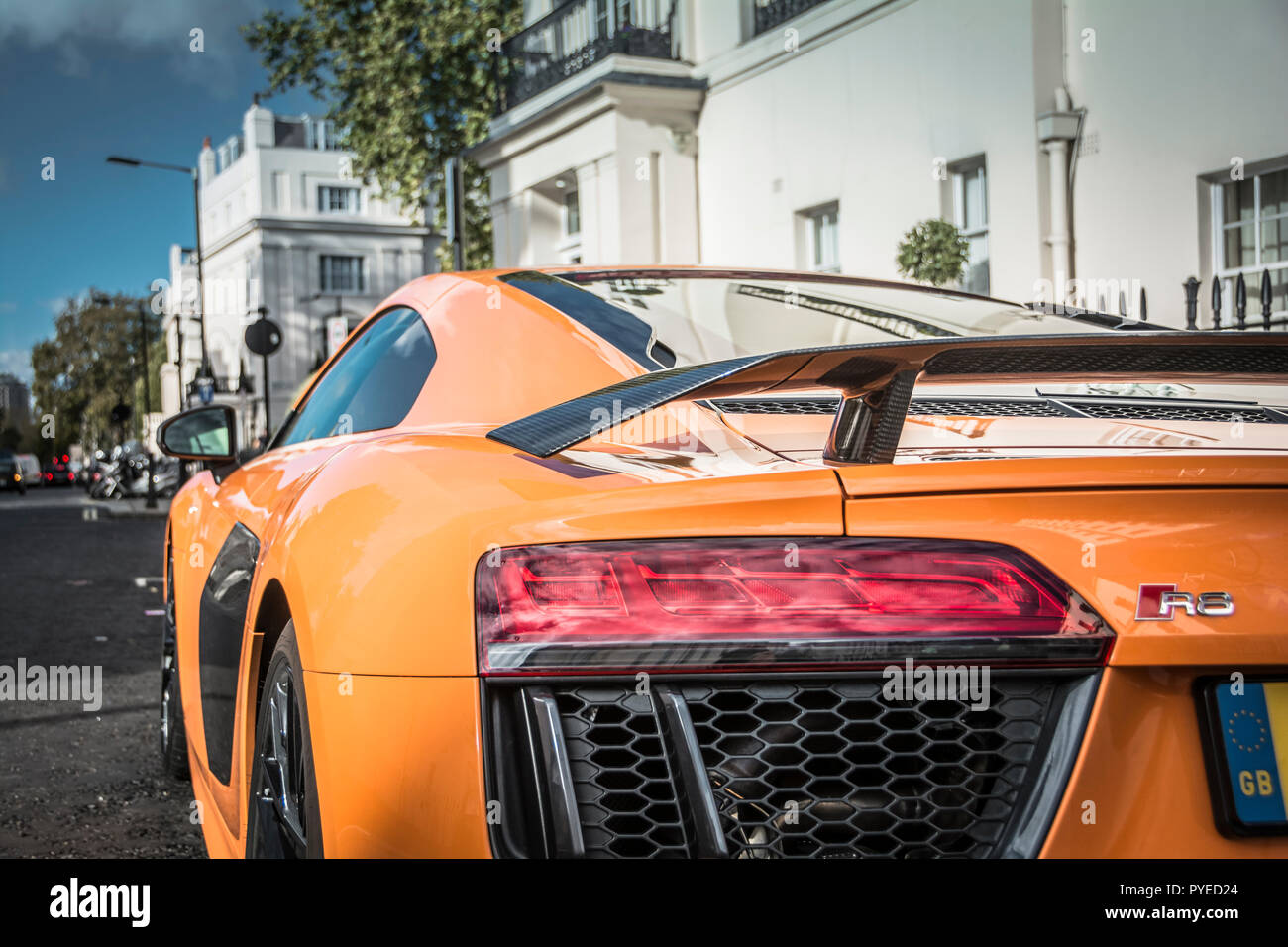 An orange Audi R8 high performance supercar in Westminster, London, UK ...
