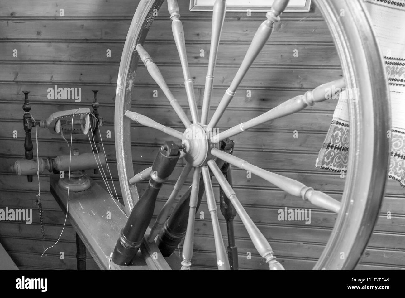 Vintage yarn spinning wheel in an old Swedish farm house in northern ...