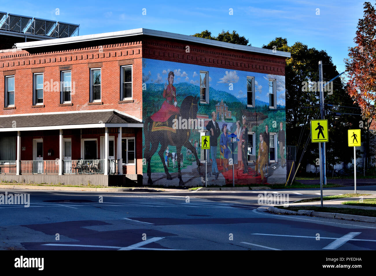 A horizontal image of the vintage Sussex Hotel with a large wall murel ...