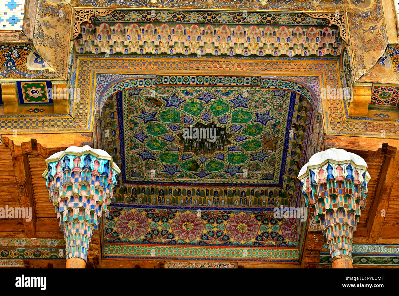 Carved wooden pillars support decorated cassette ceilings Stock Photo ...