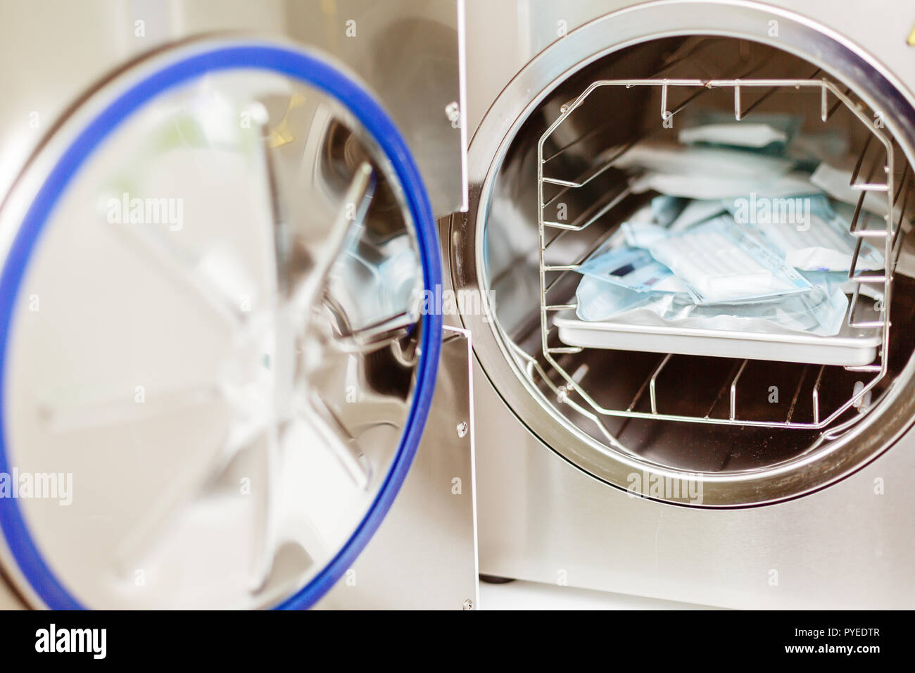 Sterilizing medical instruments in autoclave. Selective focus. Sterile ...