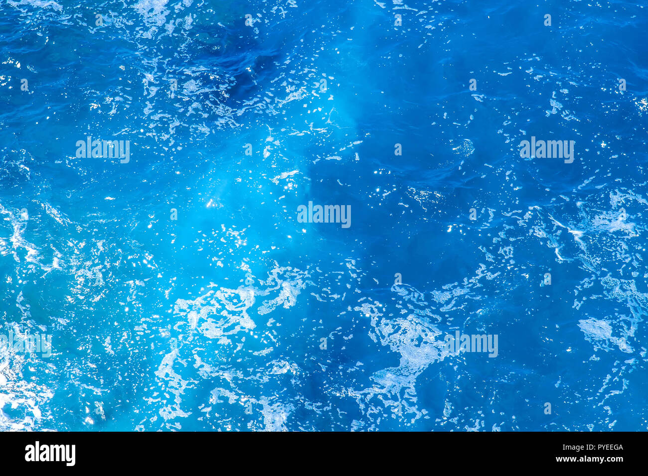 Aerial view of the clear blue sea surface on a bright sunny day Stock ...
