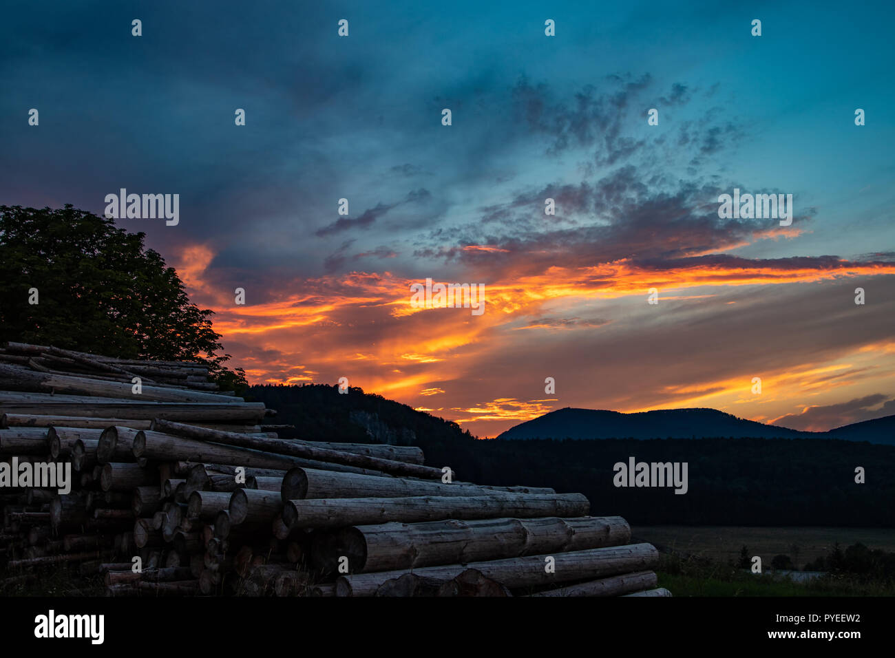 Orange and yellow sunset with mountains silhouettes. Gradient vivid ...