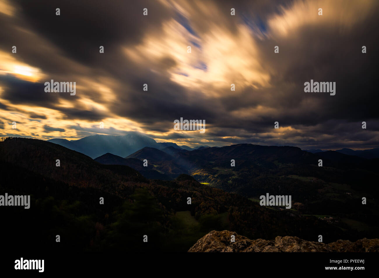 Scenic top view on the valley between the mountains, hills covered with ...