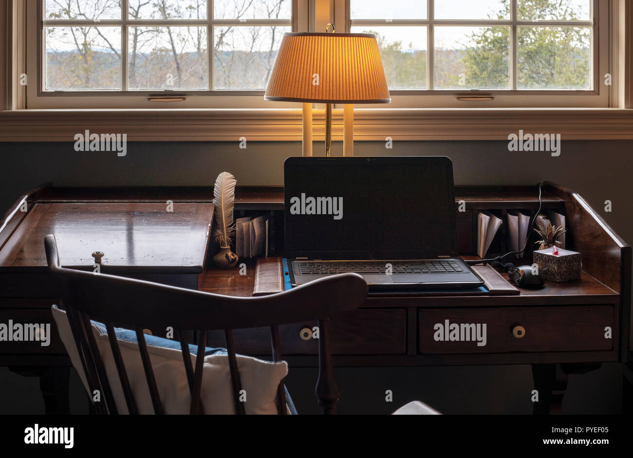 Interior view of an open laptop computer with blank screen. It is ...