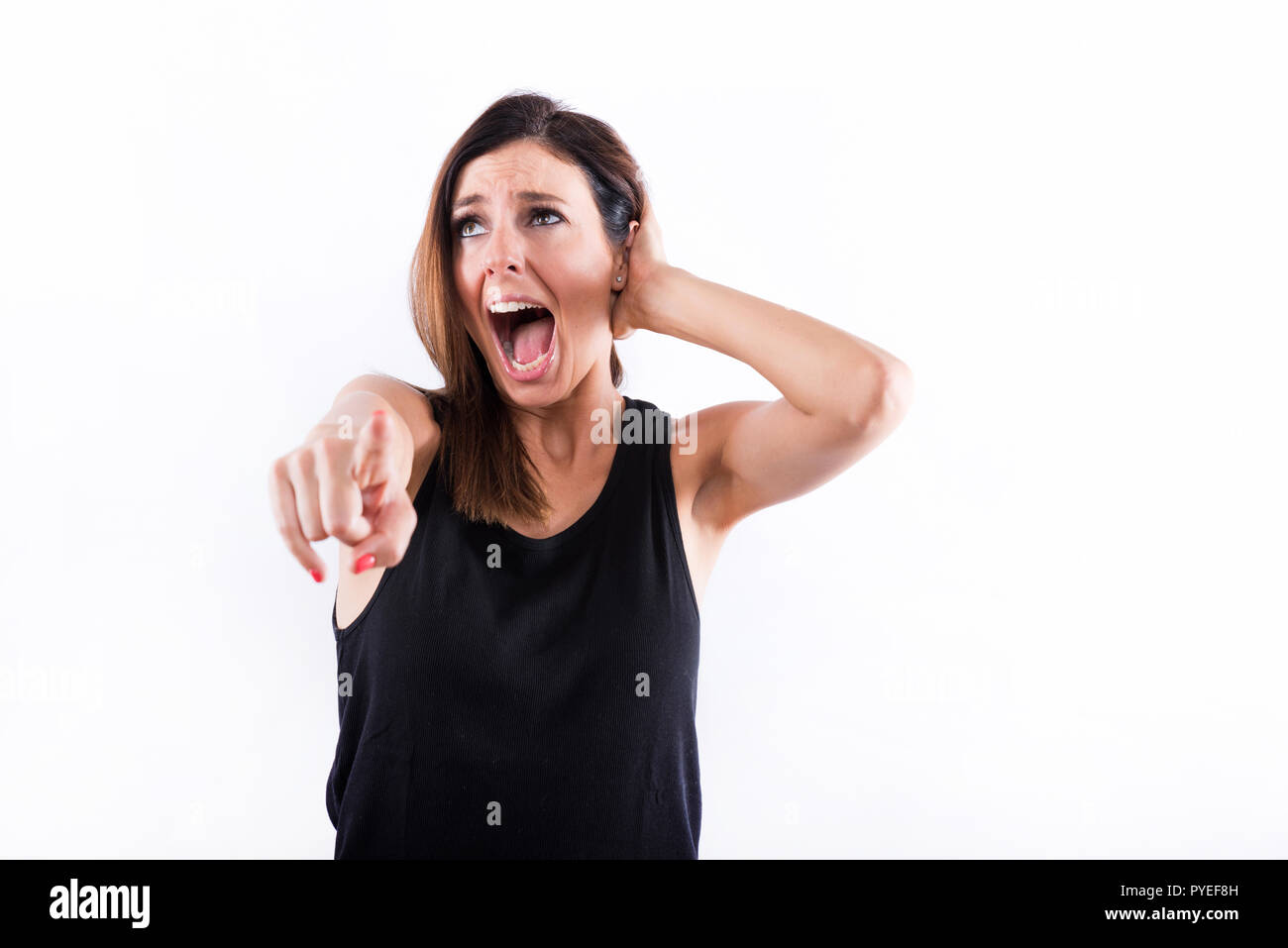 Woman pointing yelling hi-res stock photography and images - Alamy