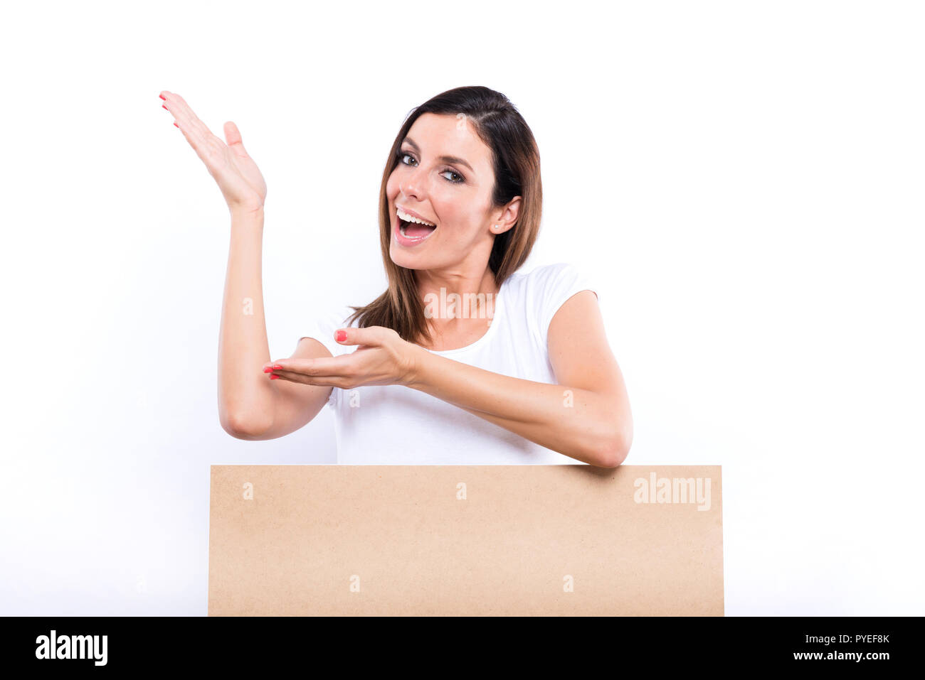 A beautiful young woman standing with a wooden box signboard and ...