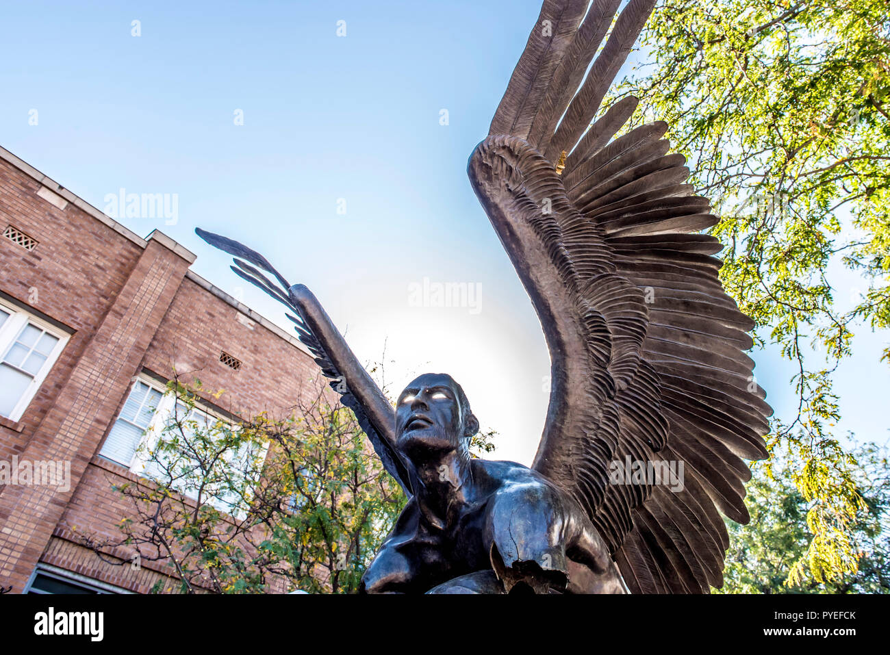 Sun shining through the eyes of an angel Stock Photo - Alamy