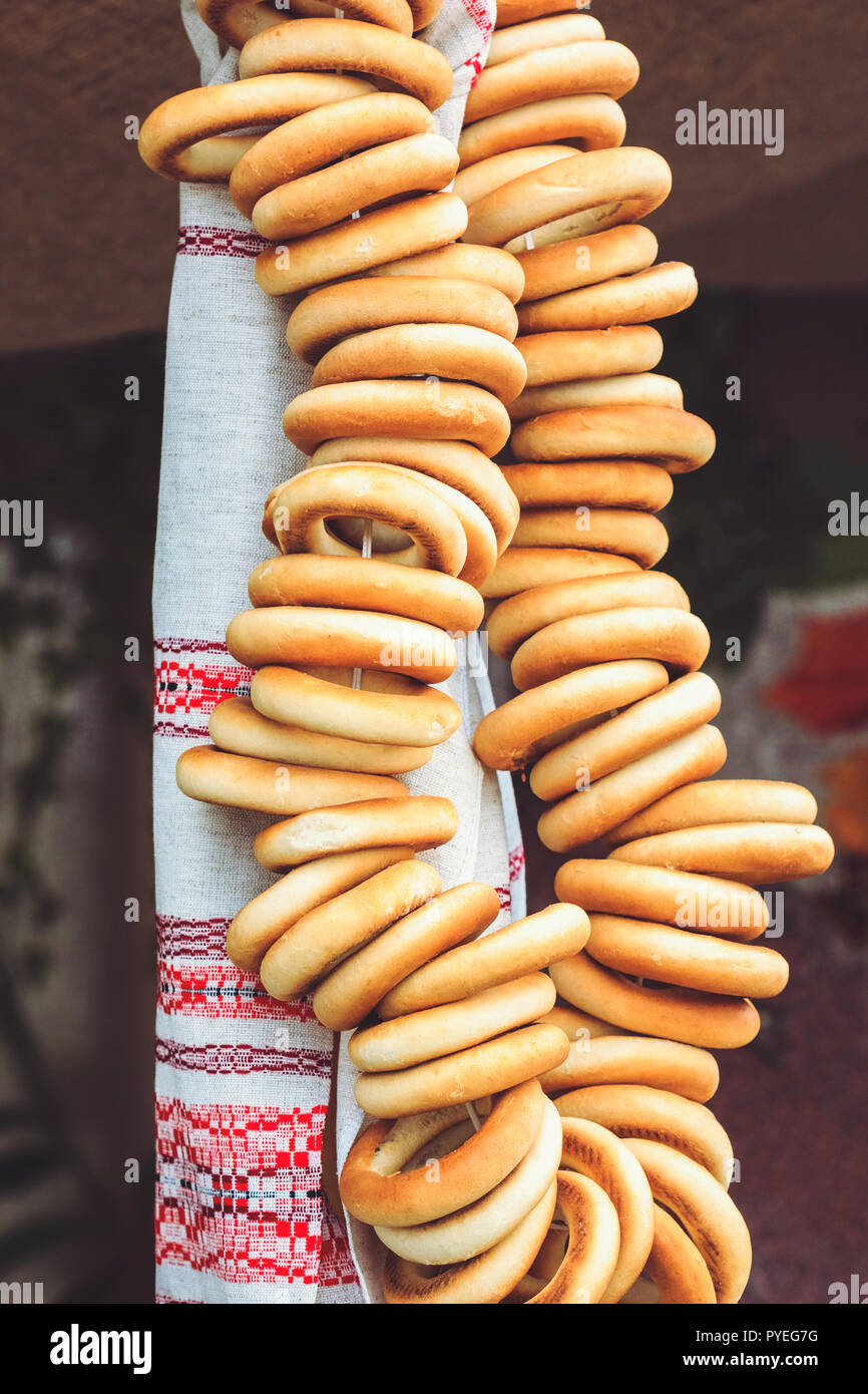 A bunch of delicious Russian bagels on a pole Stock Photo - Alamy
