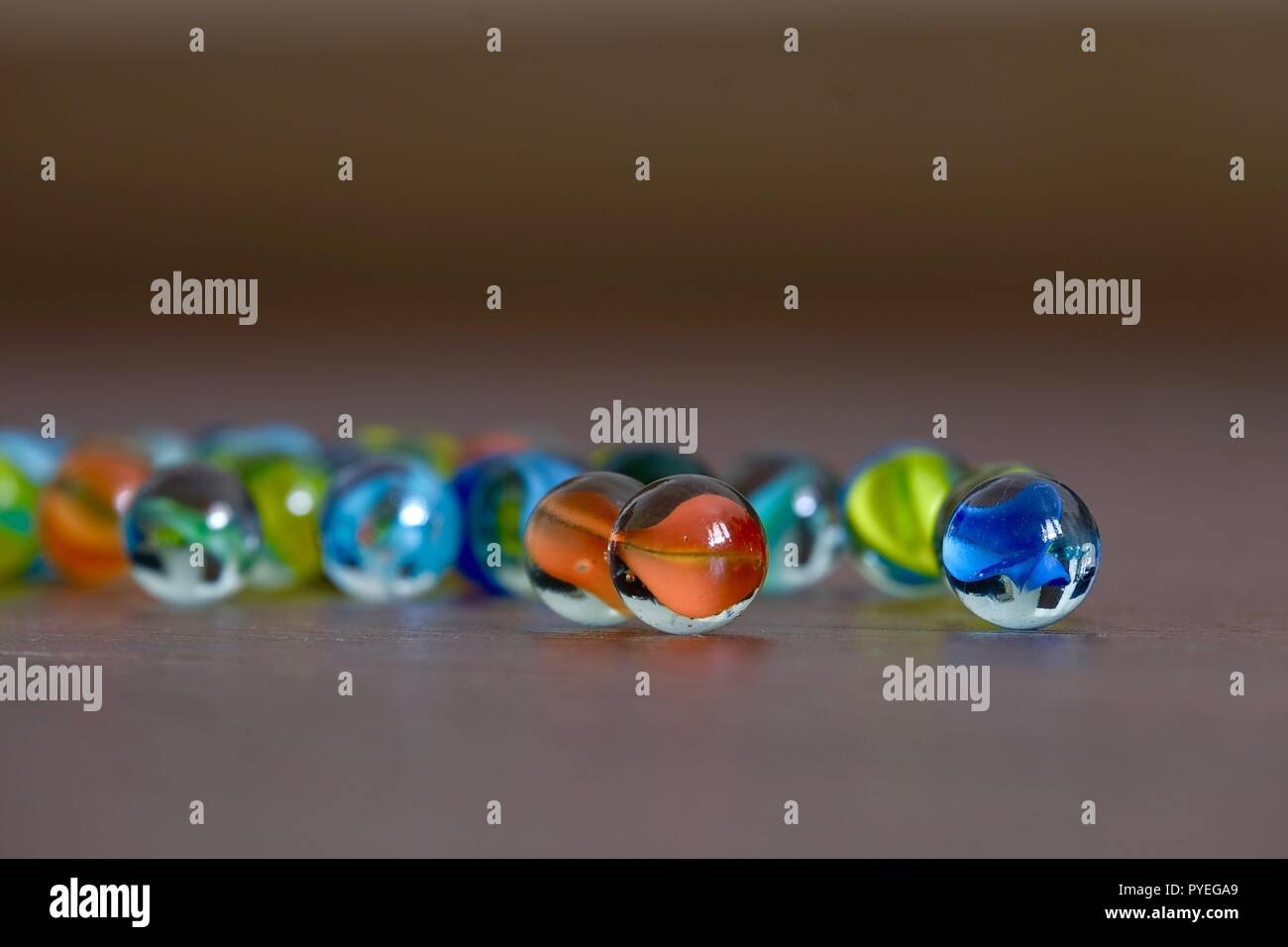 Glass colourful Marbles game Stock Photo - Alamy