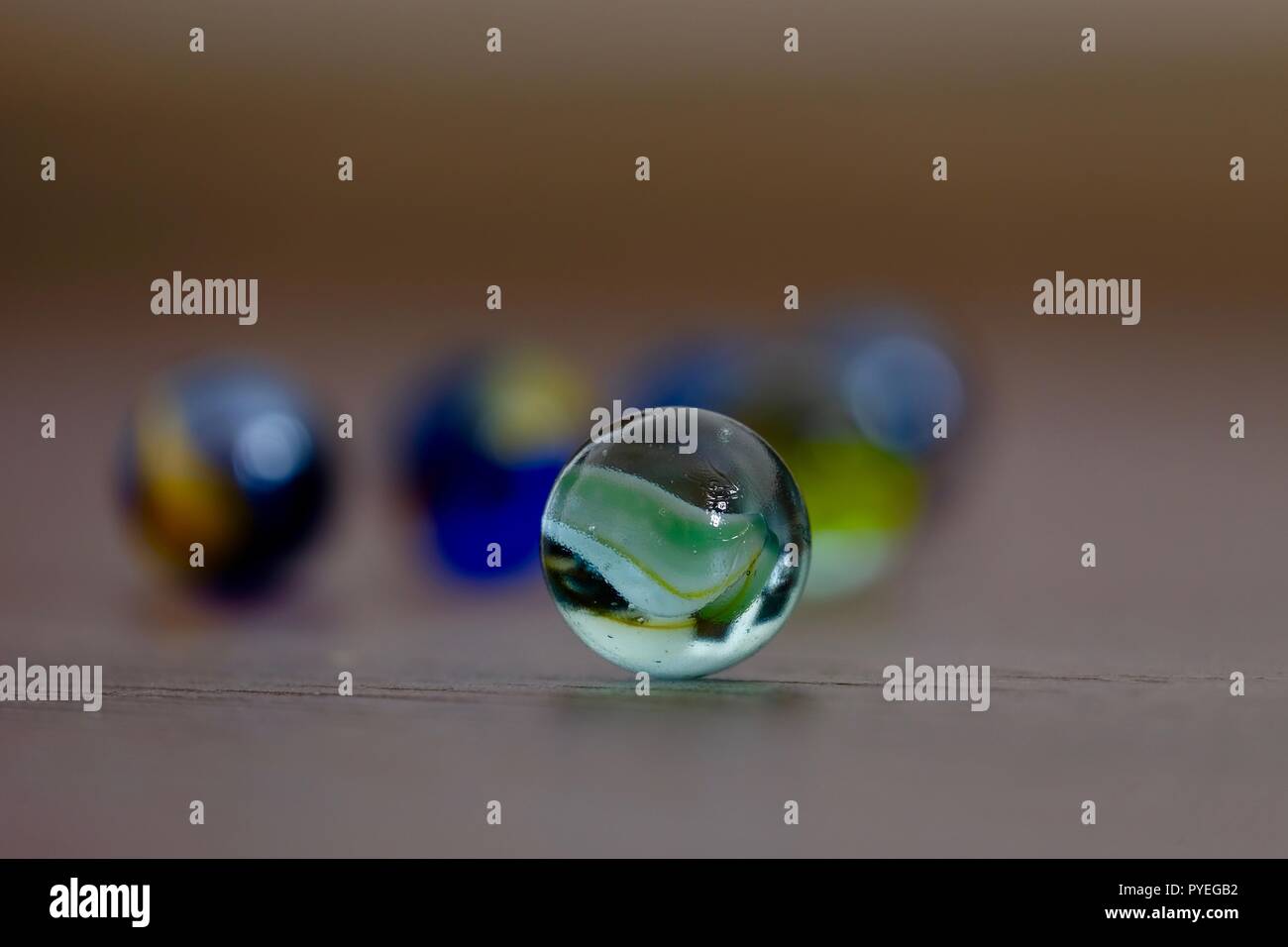 Glass colourful Marbles game Stock Photo - Alamy
