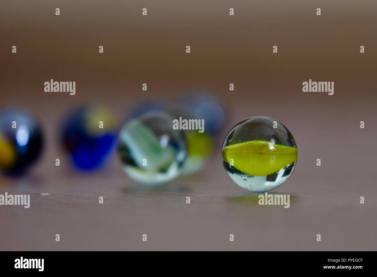 Glass colourful Marbles game Stock Photo - Alamy