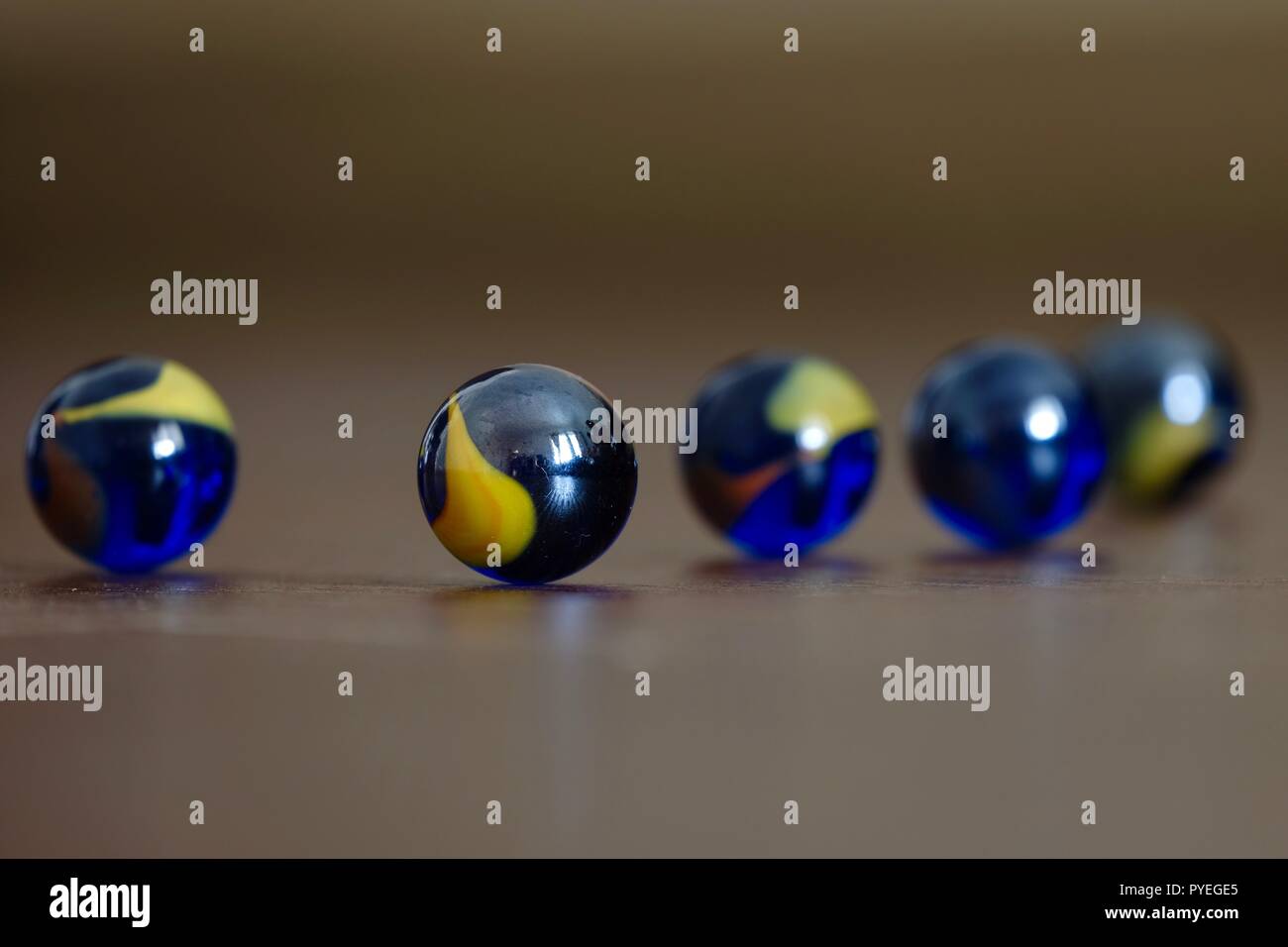 Glass colourful Marbles game Stock Photo - Alamy