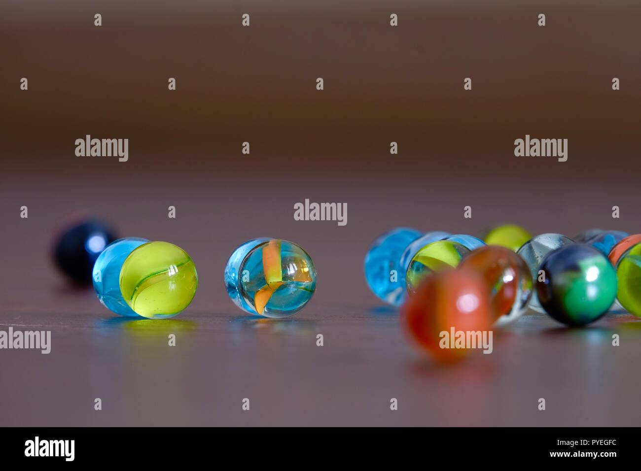 Glass colourful Marbles game Stock Photo - Alamy