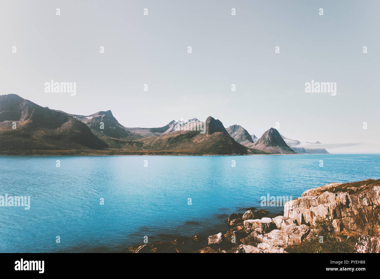 Husoy island in Norway mountains and sea landscape Travel locations ...
