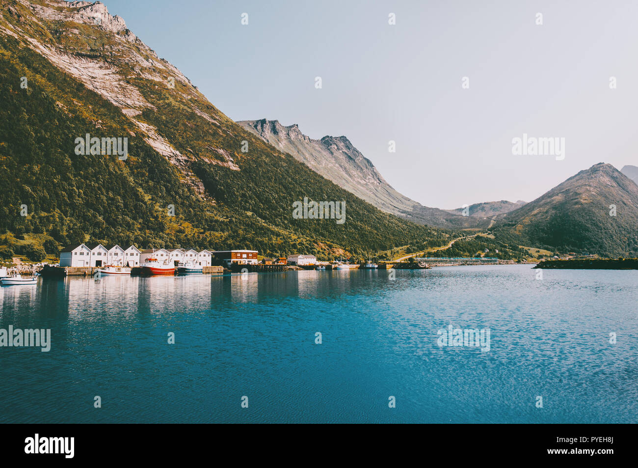 Husoy village in Norway mountains and sea fjord landscape Travel ...