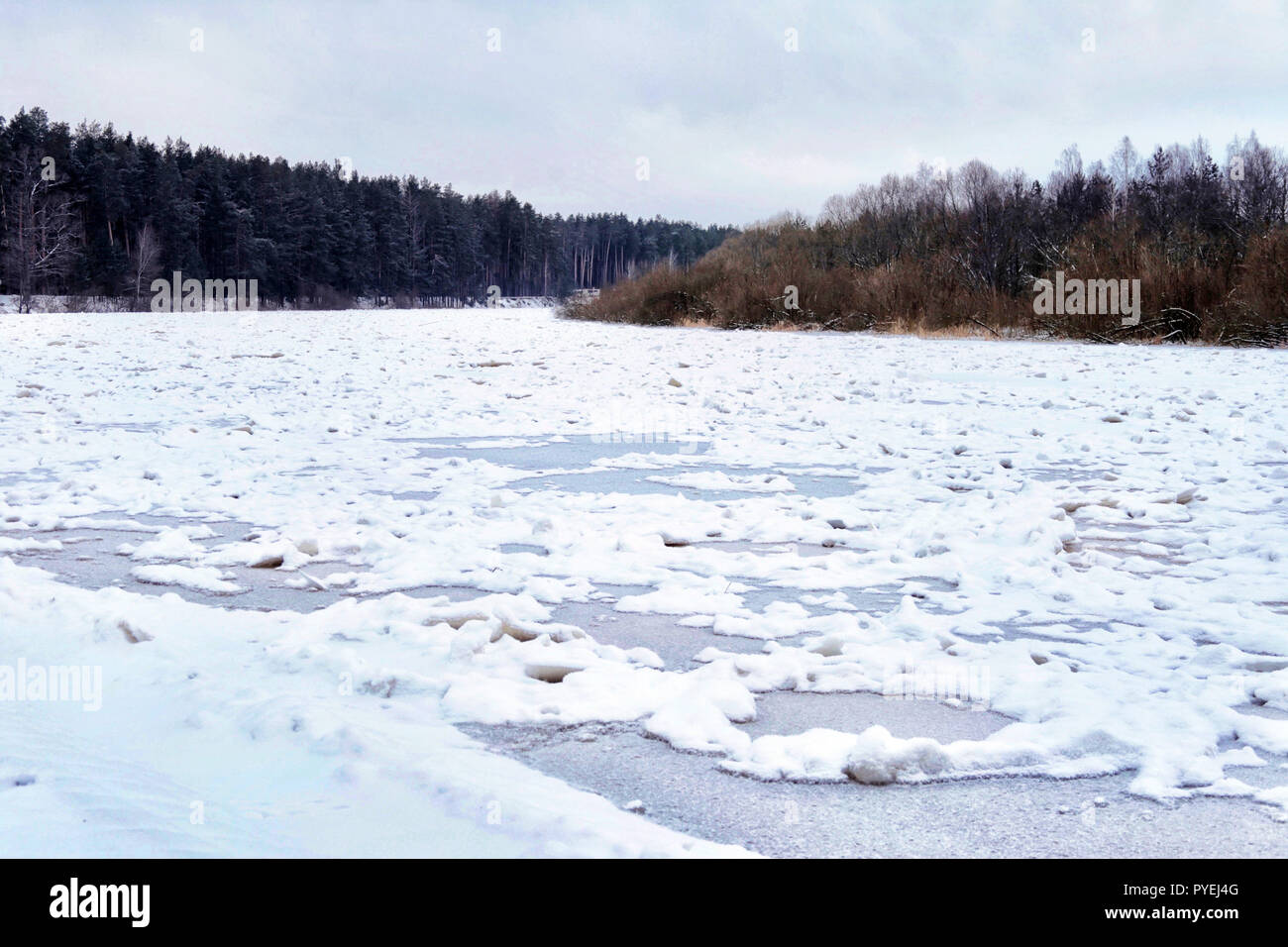 Ice and snow on the river Stock Photo - Alamy