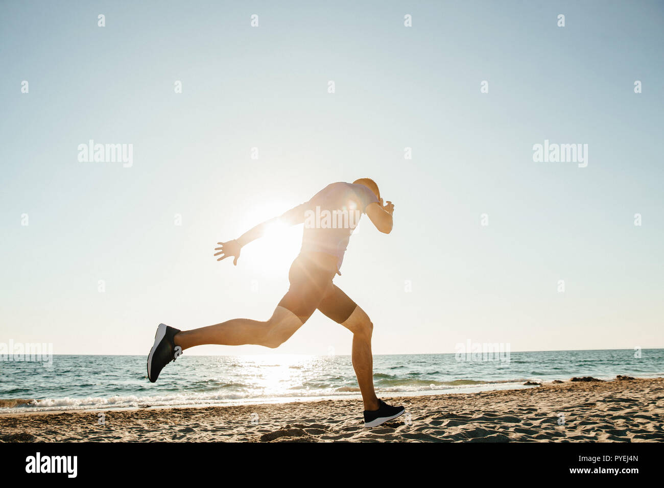 Male athlete running fast in hi-res stock photography and images - Alamy