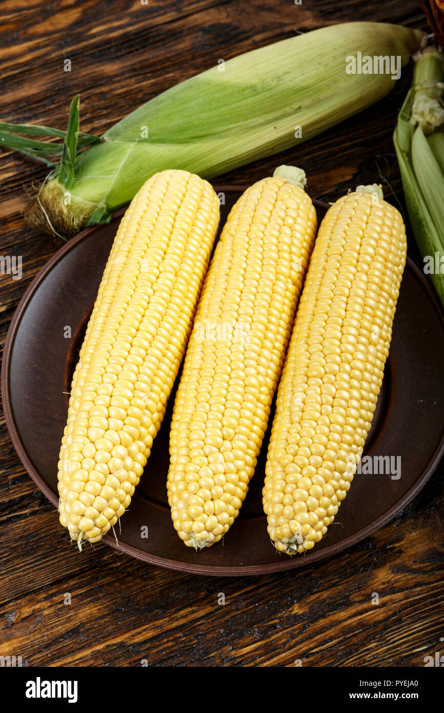 corn crop lying in a plate. Top view Stock Photo - Alamy