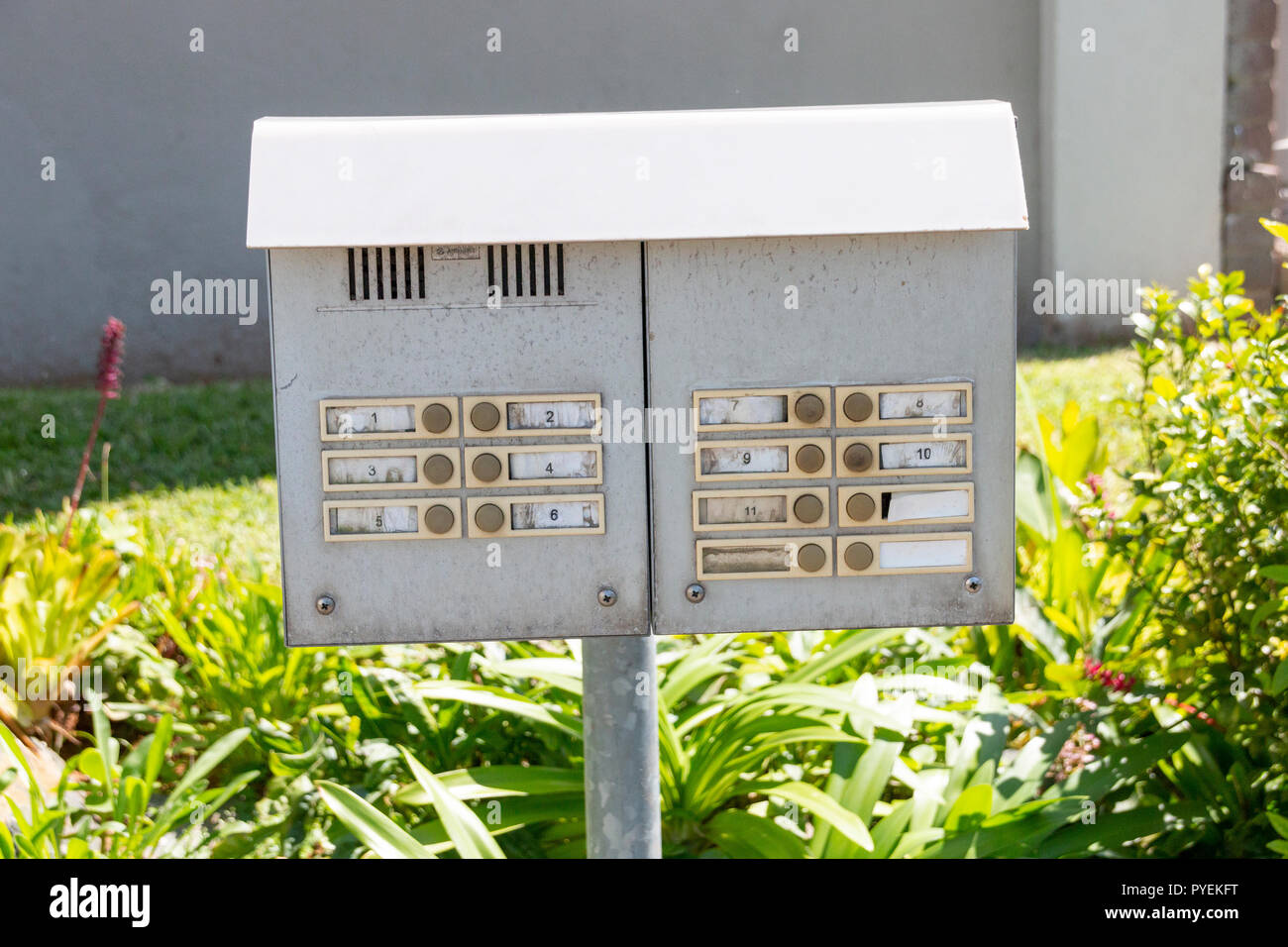 A close up view of a metal intercom outside a block of flats Stock ...