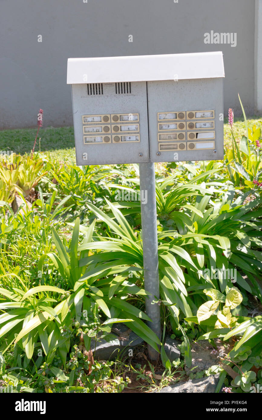 A close up view of a metal intercom outside a block of flats Stock ...