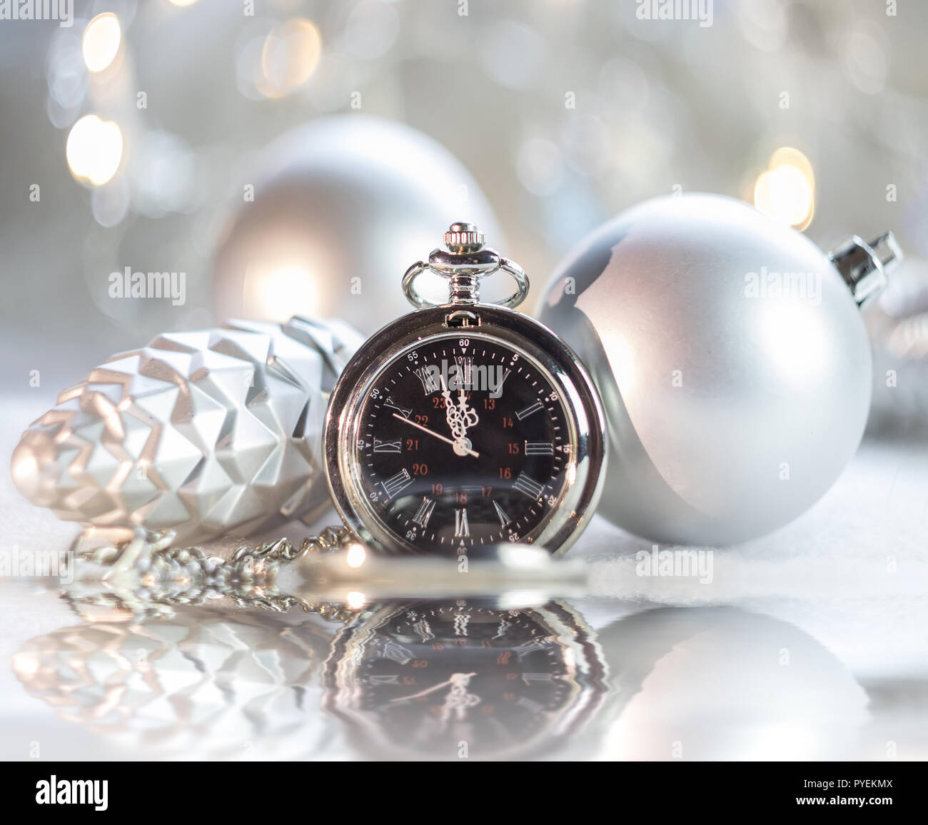 Christmas background with pocket watches and reflection Stock Photo - Alamy