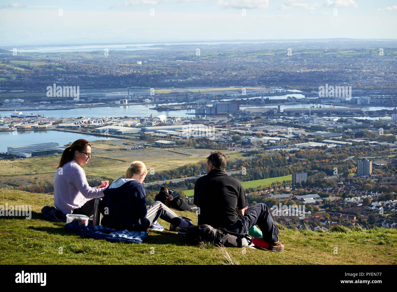 family having picnic on mcarts fort at the top of Cave Hill overlooking ...