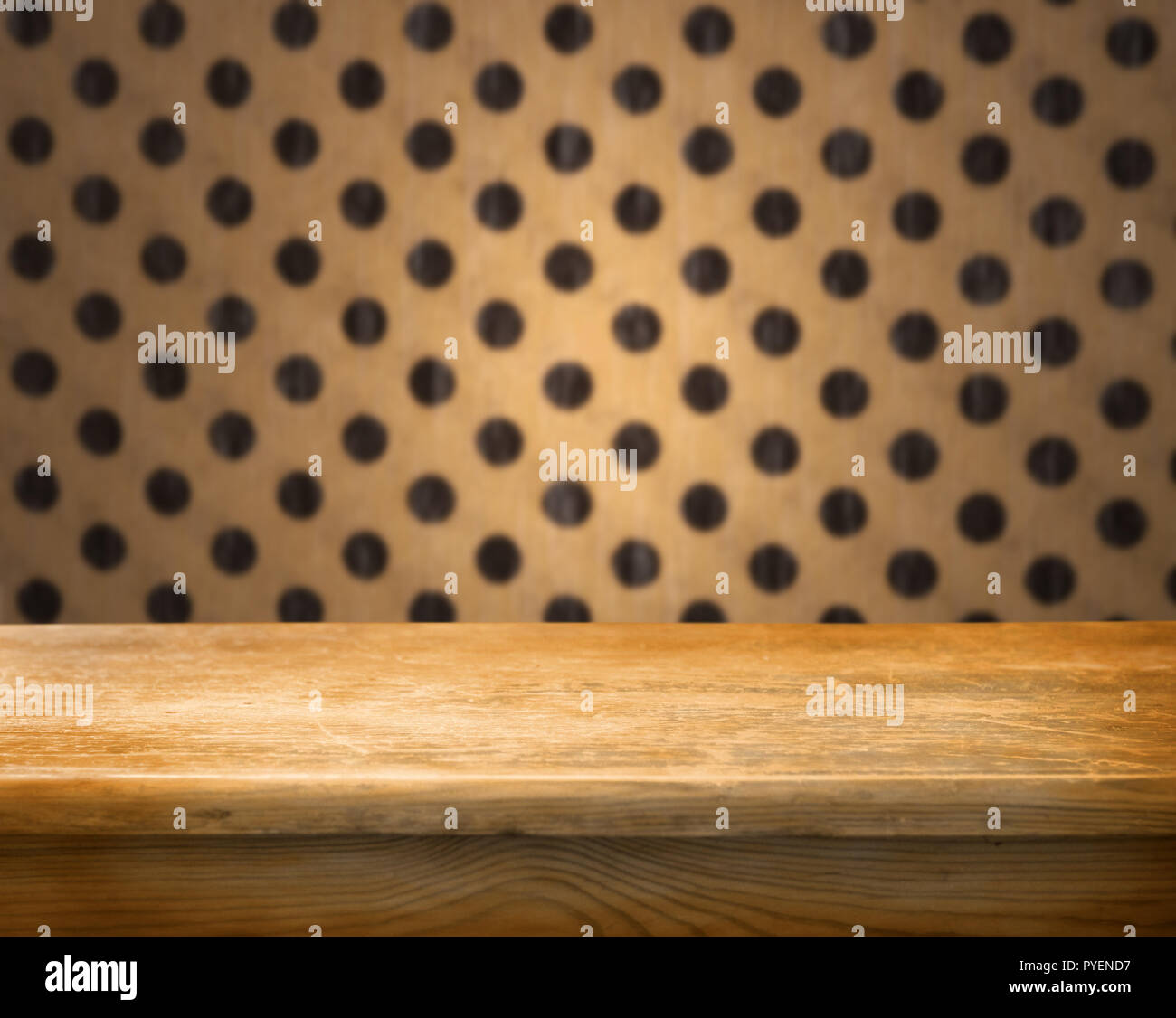 Empty checkered table and wall with black dots Stock Photo - Alamy