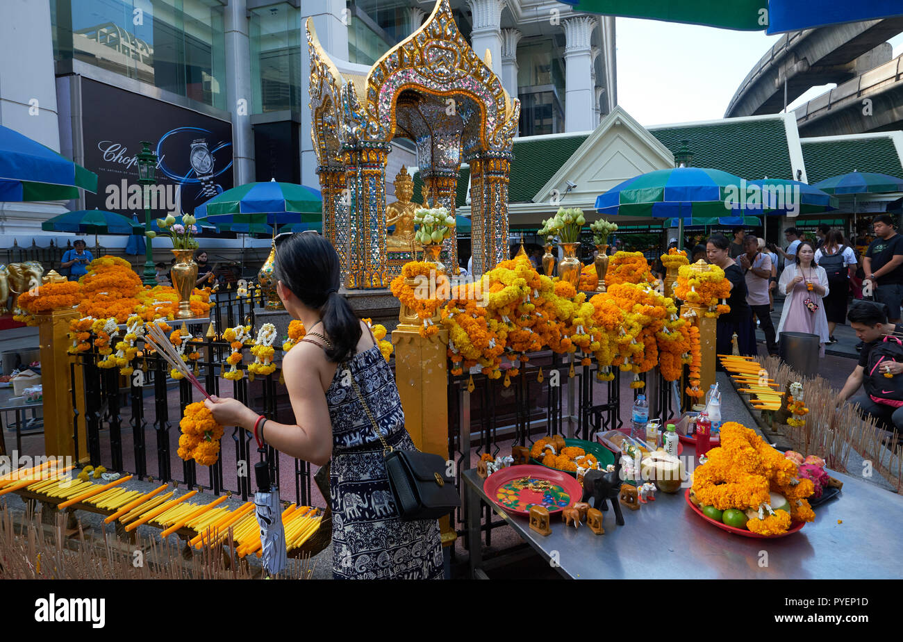 The Erawan Shrine next to the Grand Hyatt Erawan Hotel in Bangkok ...