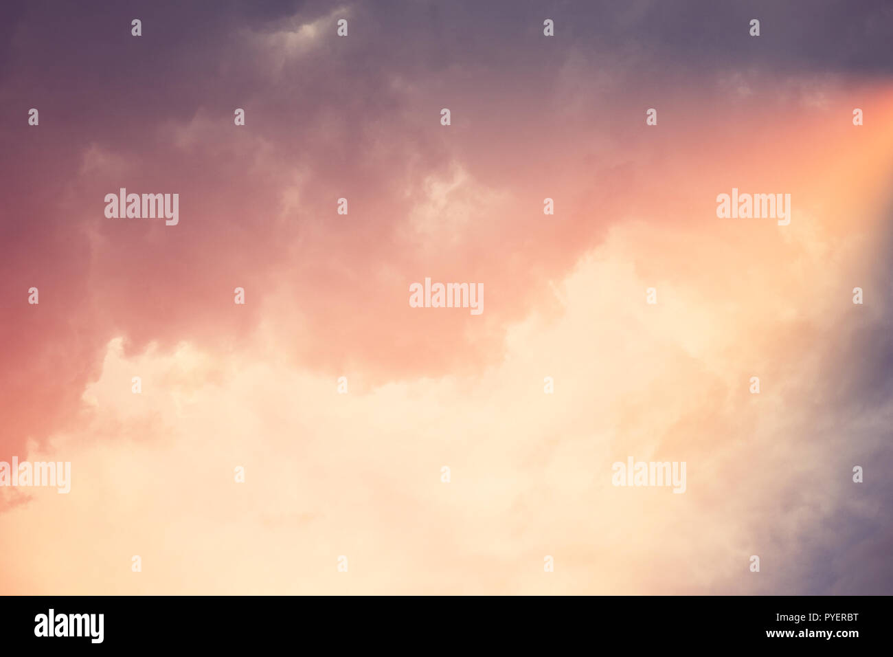 Nature background. Fluffy soft clouds in sky toned Stock Photo - Alamy