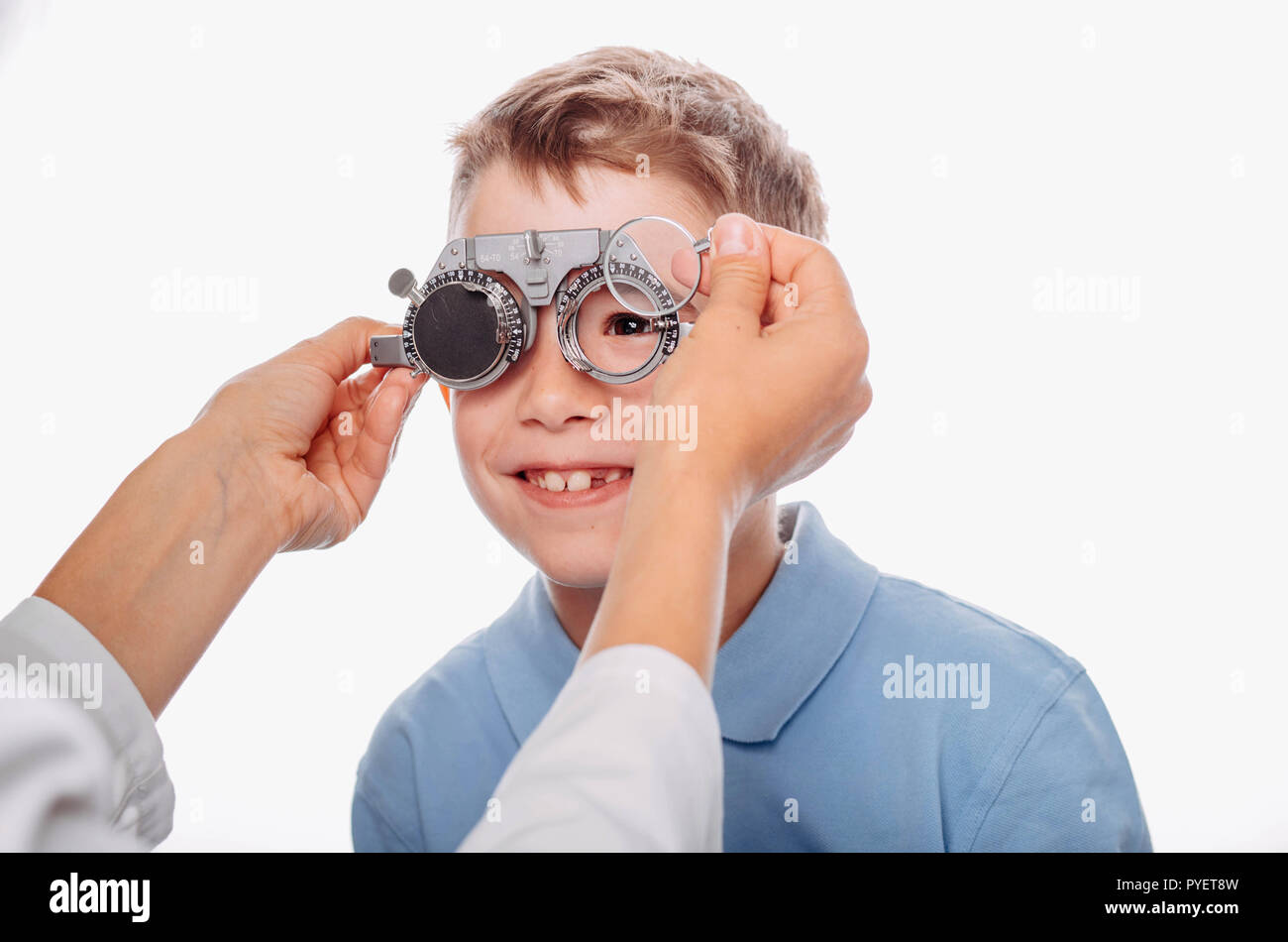 little boy, having his eyesight examining. Children eye examination ...
