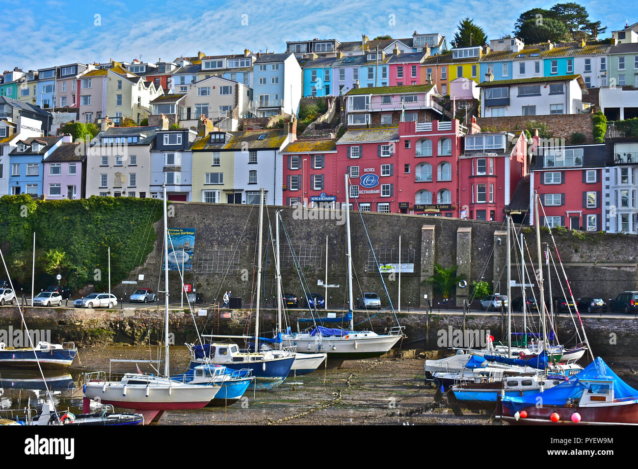 Brightly coloured houses cling to the hillside overlooking thepretty ...
