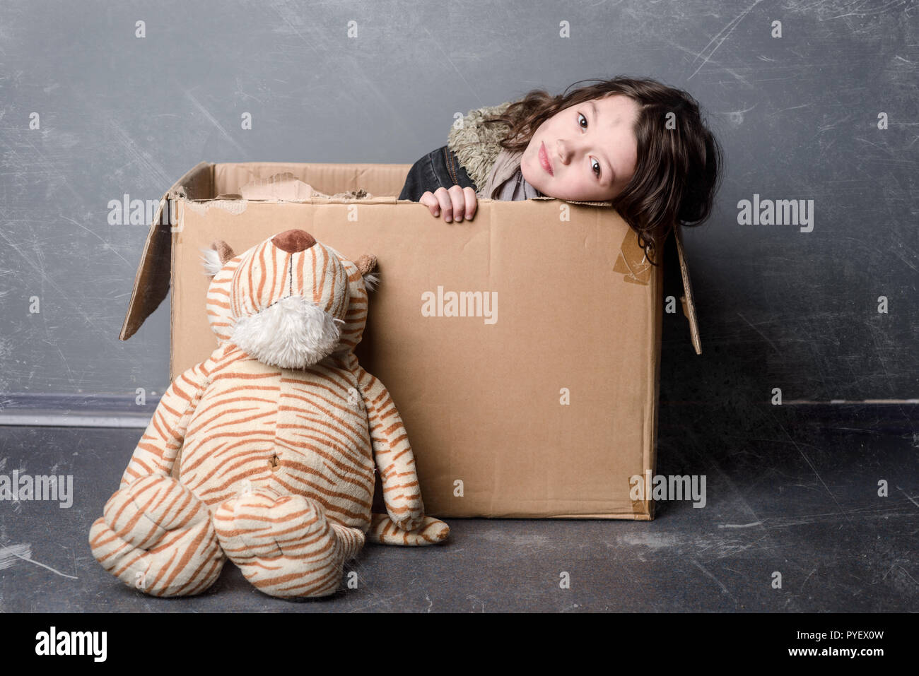 Beautiful girl in paper box Stock Photo - Alamy
