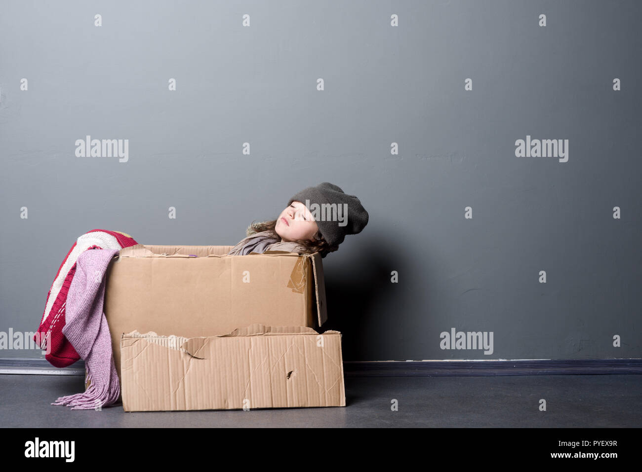 Sad kid box hi-res stock photography and images - Alamy