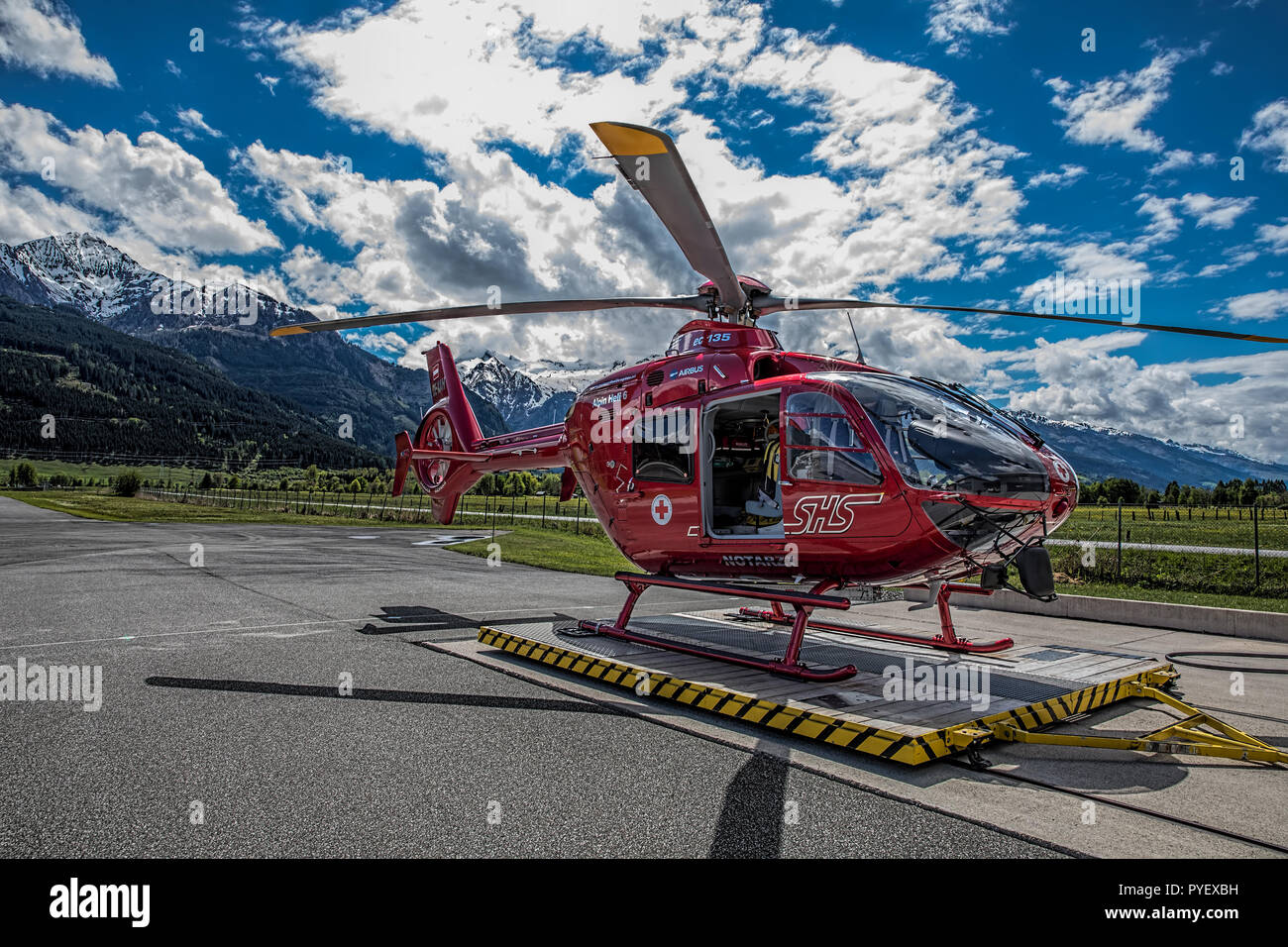 Airbuss EC135 Alpin Heli 6 at the Zell am See Aiirfield Stock Photo - Alamy