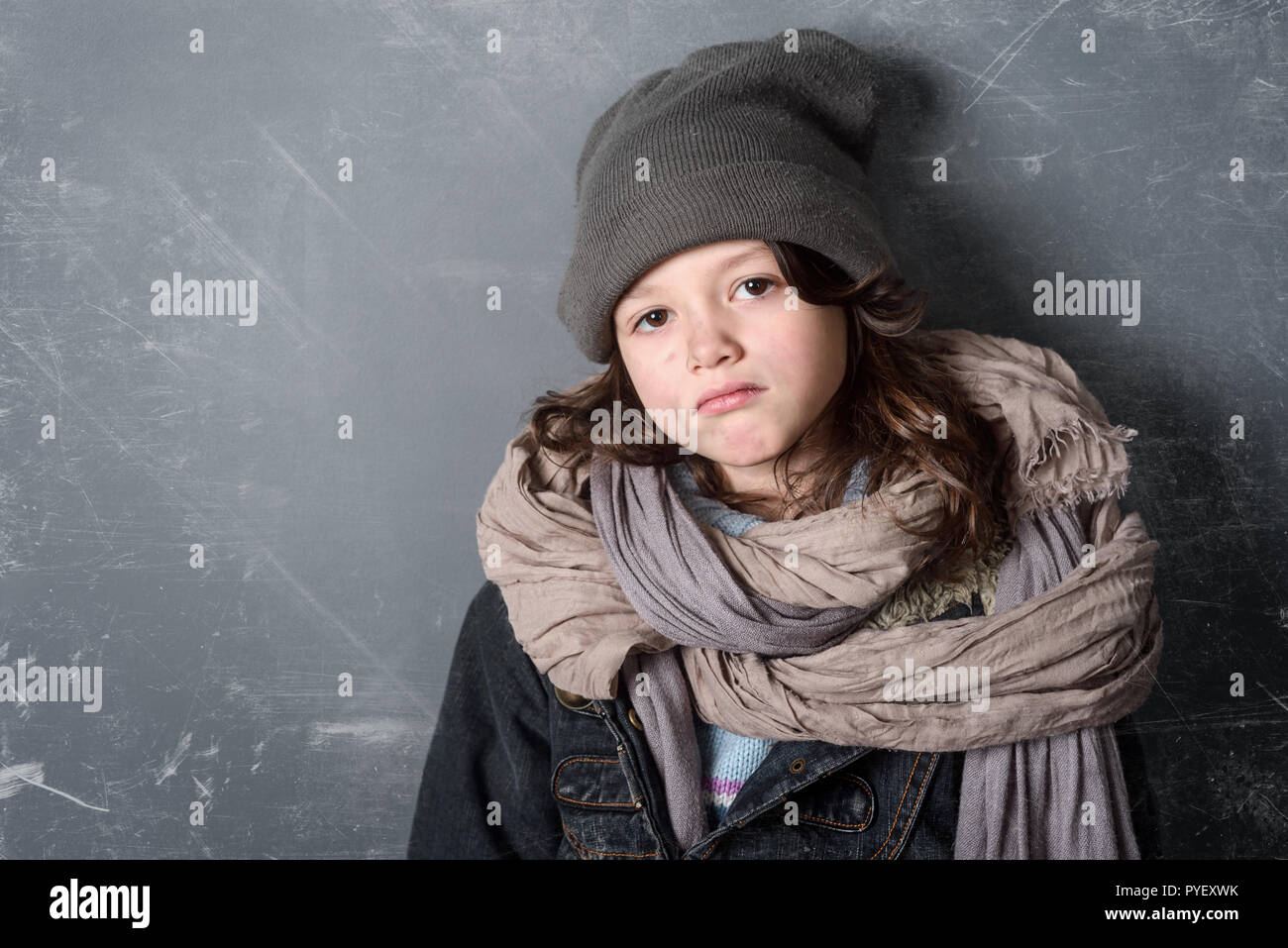 Upset girl with dirty face Stock Photo - Alamy