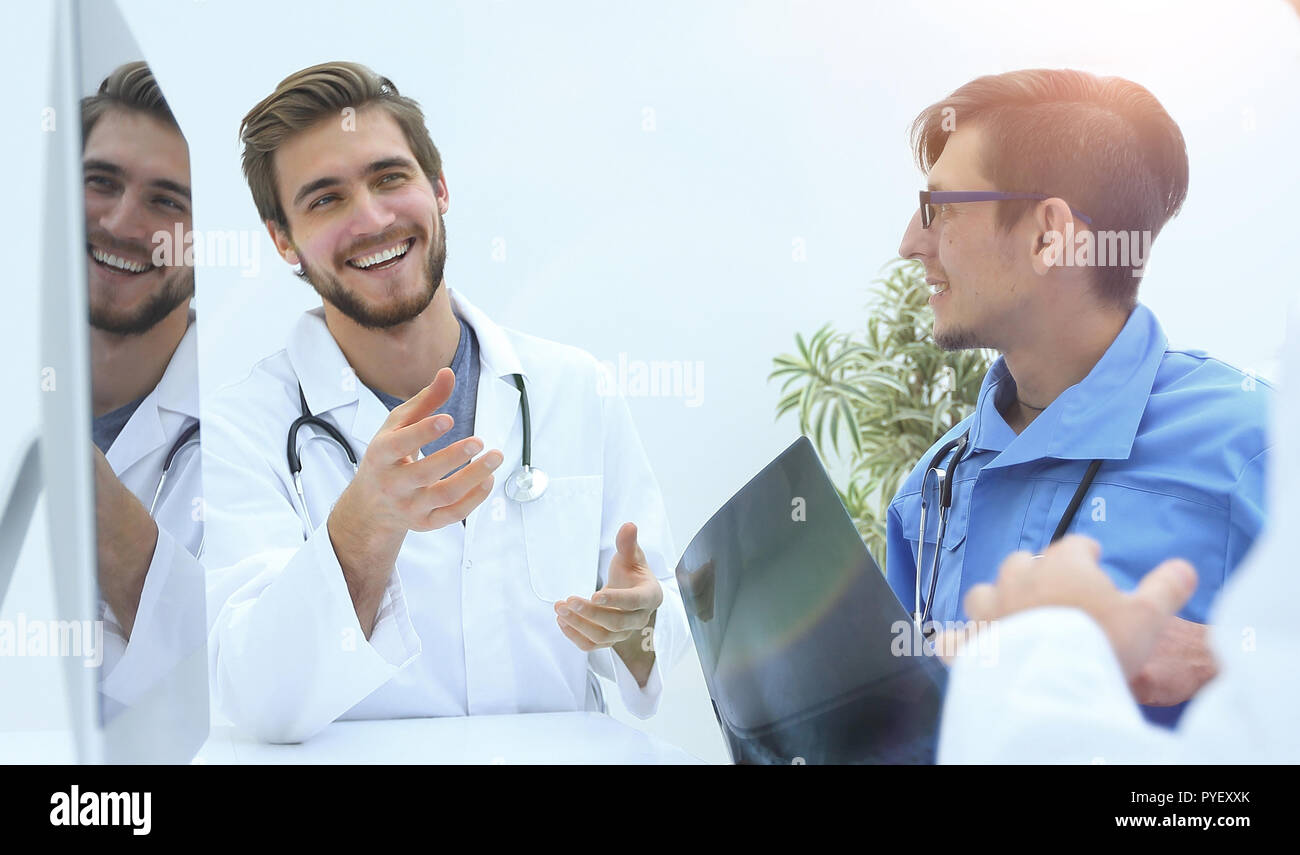 Professional multiethnic doctors talking hi-res stock photography and ...